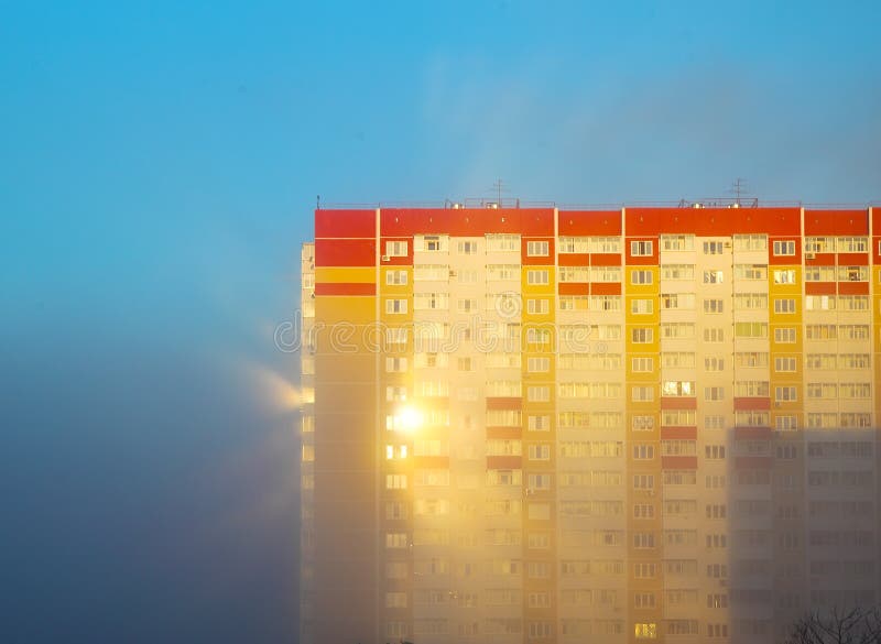 Building in the Fog, Sunrise Stock Image - Image of dramatic, sunrise ...