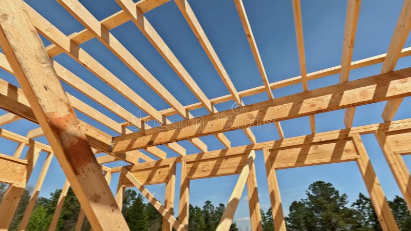 Building a Frame House Made Out of Wooden Beams and Stick Framework for ...