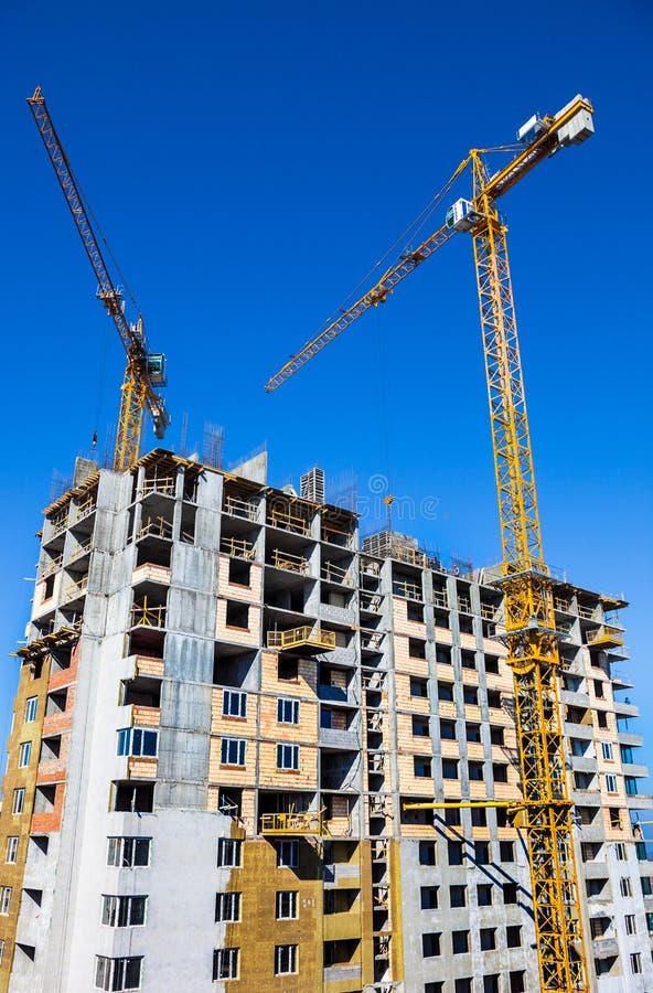 Setting up a tower crane stock photo. Image of site, metal - 20900974