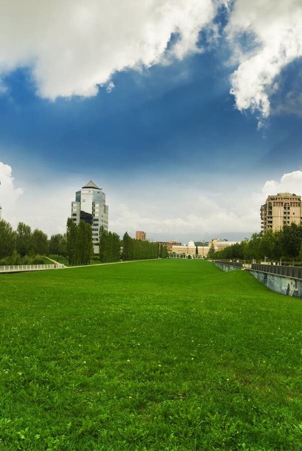 Building and grass stock photo. Image of daytime, company - 57164072