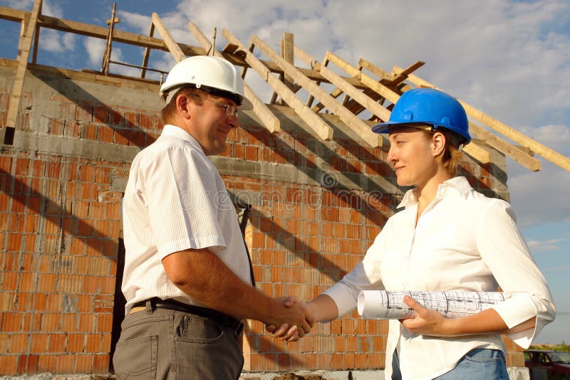 Building handshake stock image. Image of developer, industry - 5999929