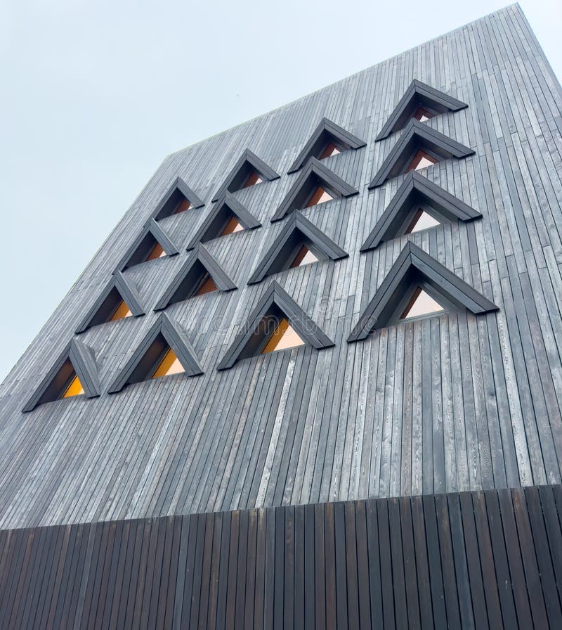 The Building Has a Lot of Windows and a Triangular Design Stock Image ...