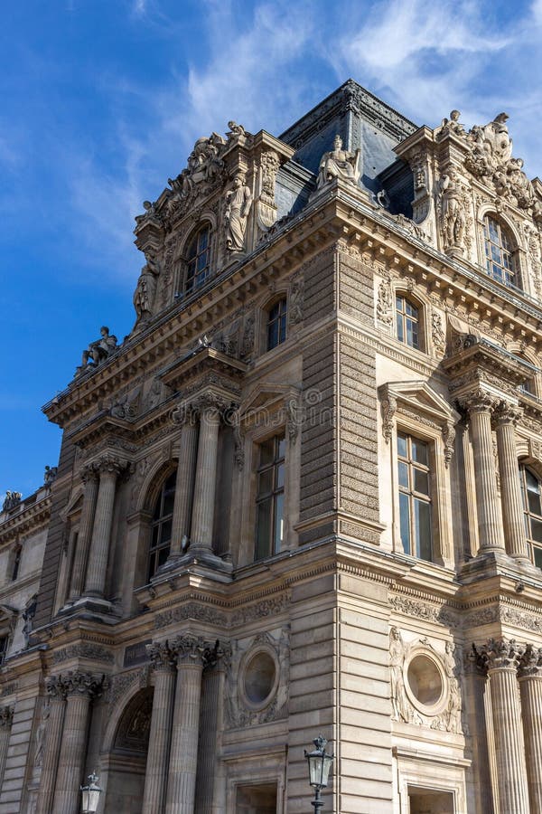 The Building Has Multiple Windows and Arched Roofing on it Stock Image ...