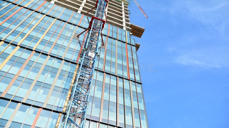 View of a Skyscraper Under Construction. Modern Architecture Background ...