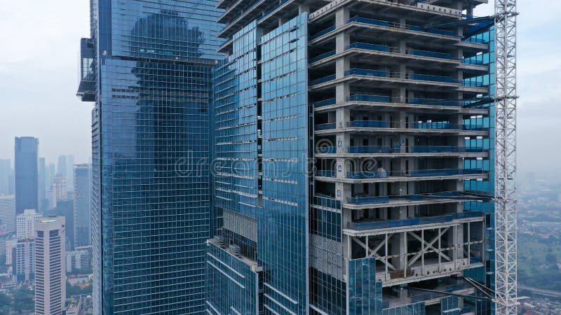 Building a High-rise Building, View of a Skyscraper Under Construction ...