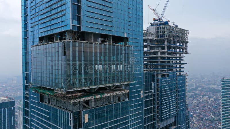 Building a High-rise Building, View of a Skyscraper Under Construction ...