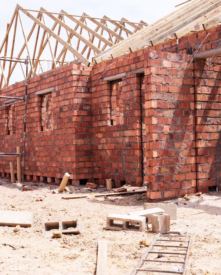 Building Homes One Brick at a Time Stock Image - Image of wood, exterior: 256947513
