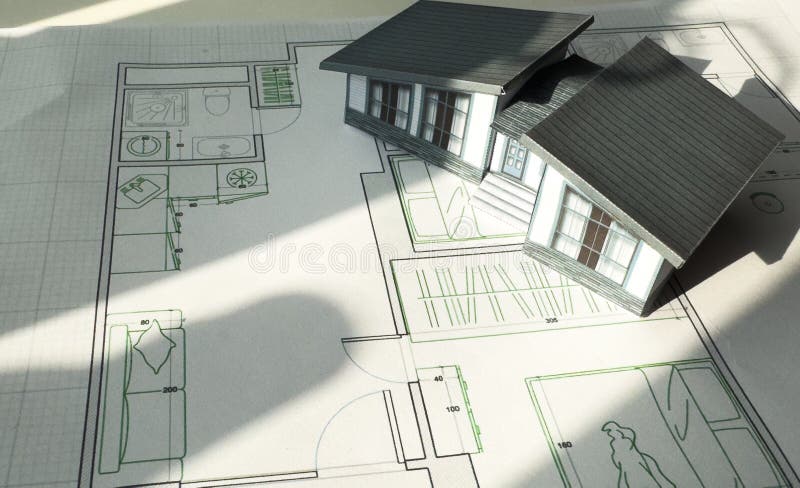 Building House on Blueprints with Worker Construction Project Stock ...