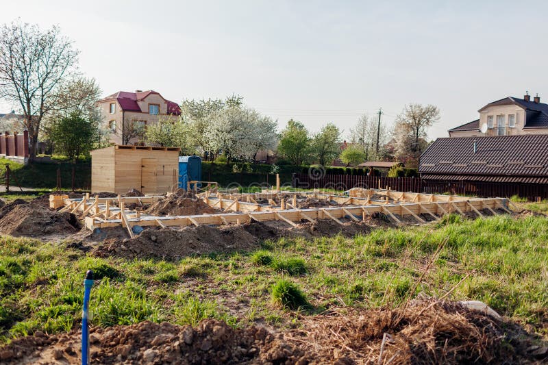 Building House. Concrete Foundation Surrounded with Wooden Decking is ...