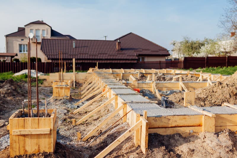 Building House. Concrete Foundation Surrounded with Wooden Decking is ...