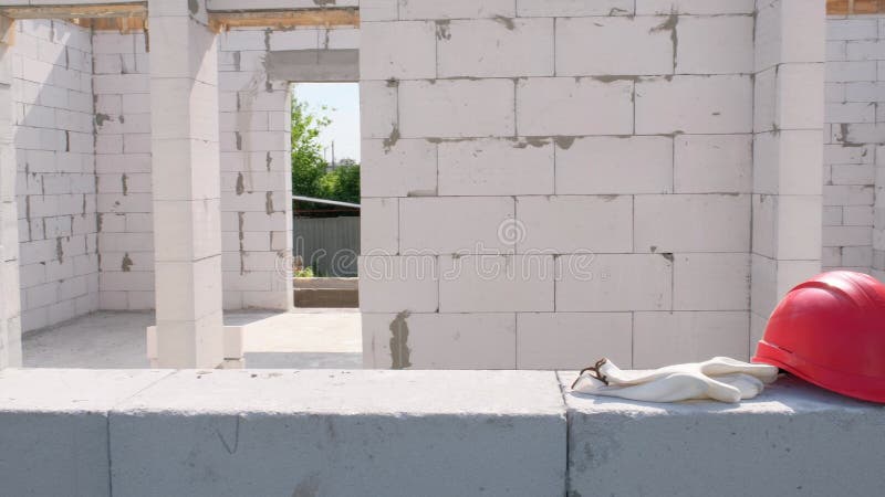 Building a House from a White Gas Block or Foam Block at a Construction ...