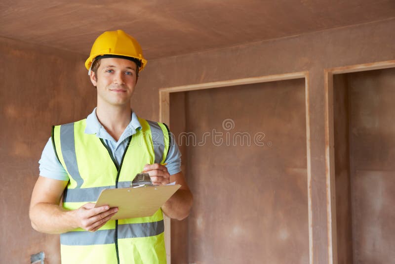 Building Inspector Looking at New Property Stock Photo - Image of ...