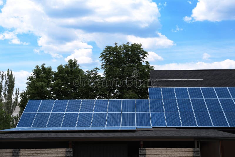 Building with Installed Solar Panels. Alternative Energy Source Stock ...