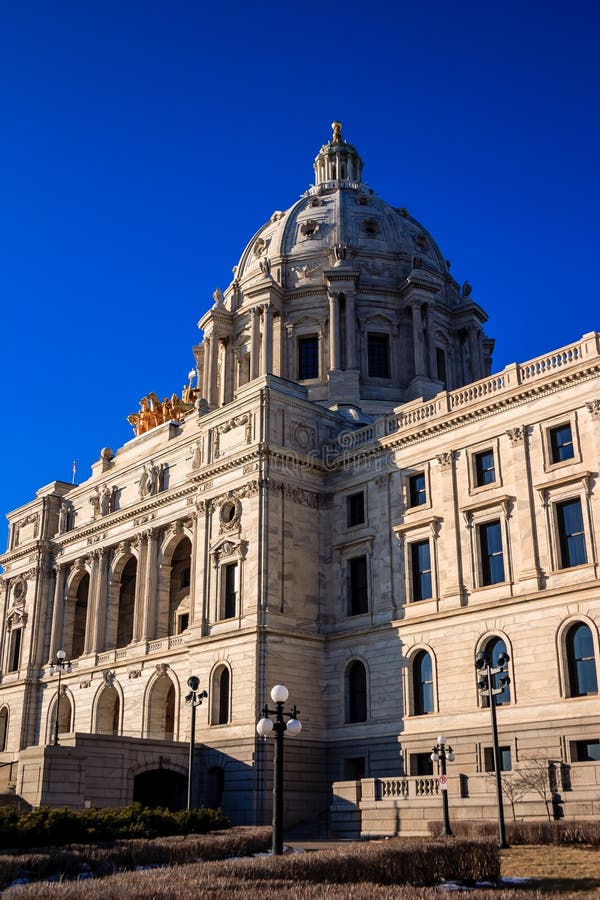 The Building is a Large, White, and Grey Structure with a Dome on Top ...