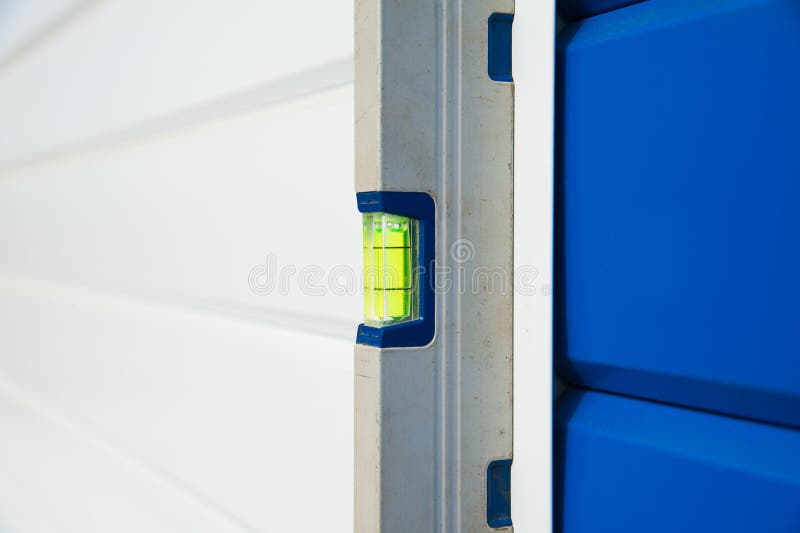 Building level stock image. Image of white, masonry, tool - 68307689