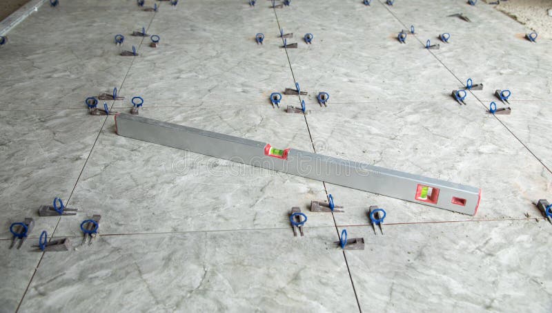 Building Level on the Floor. Renovating the Floor Stock Photo - Image ...