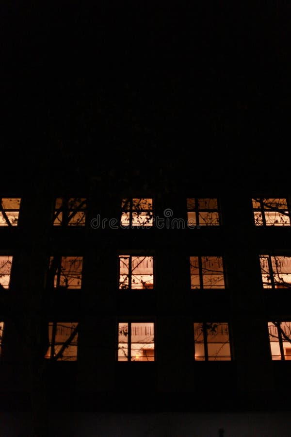Building with the Lights on at Night Stock Photo - Image of window ...