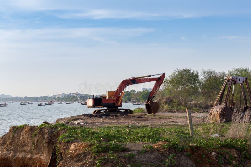 Building Machines: Digger Loading Trucks with Soil. Excavator Loading ...