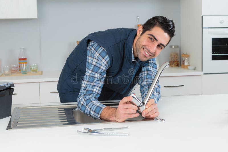 The Building Maintenance Man Stock Photo - Image of defective, pose ...
