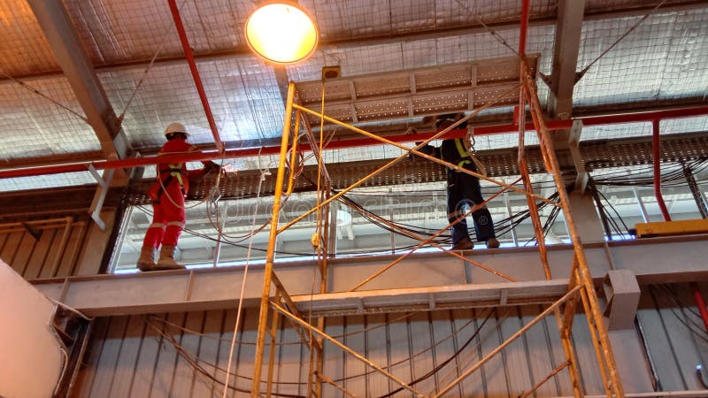 Building Maintenance Service Stock Photo - Image of beam, vehicle ...