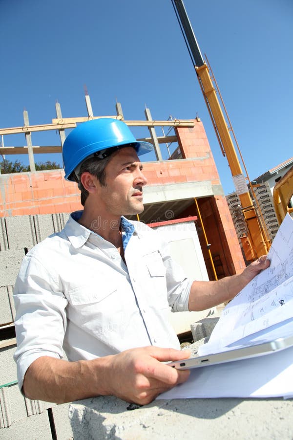 Building manager on site stock photo. Image of plan, manager - 21665136