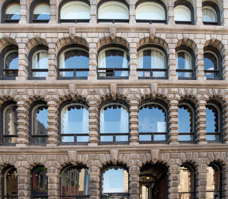 Building with Many Windows in Montreal Quebec Stock Photo - Image of ...