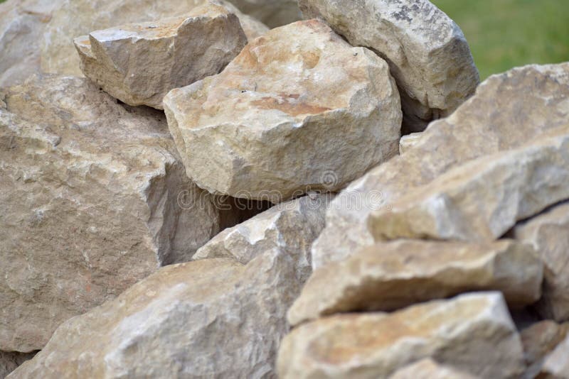 Building Material Stone. the Light Stone is Straightened in a Pile ...