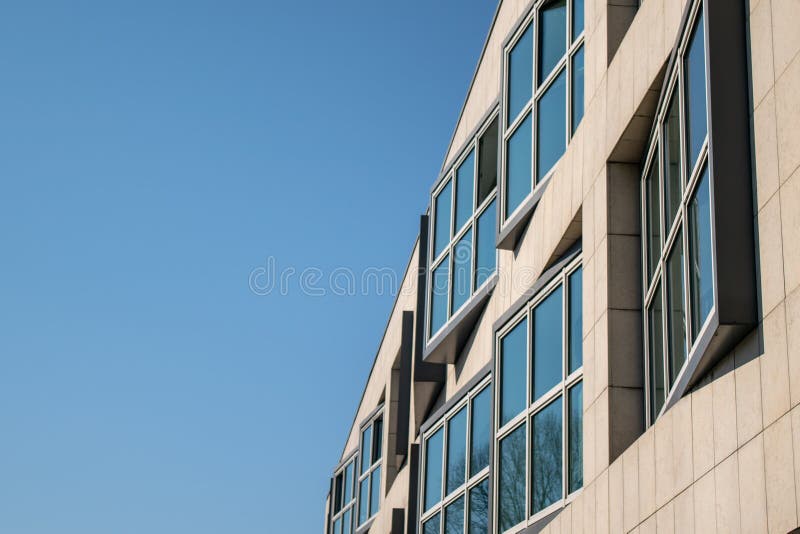 Building, Modern Windows: on an Eclectic Facade of a Small Portion of ...