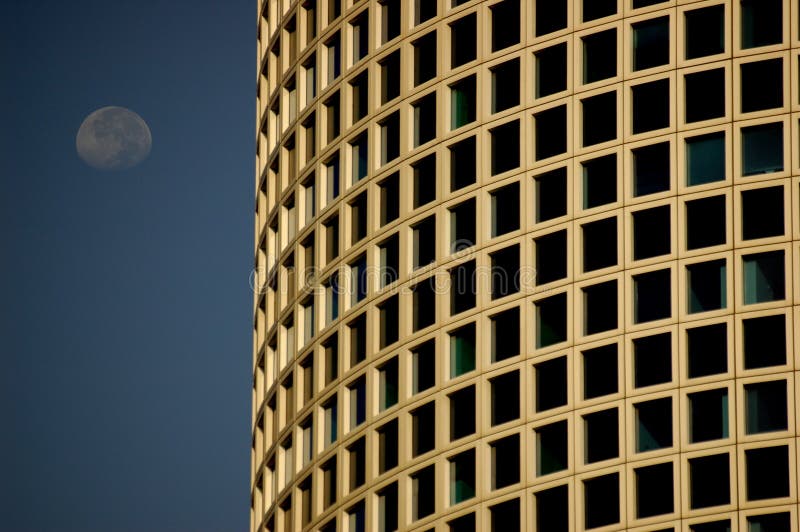 Building and moon stock photo. Image of moon, bussy, tall - 249024