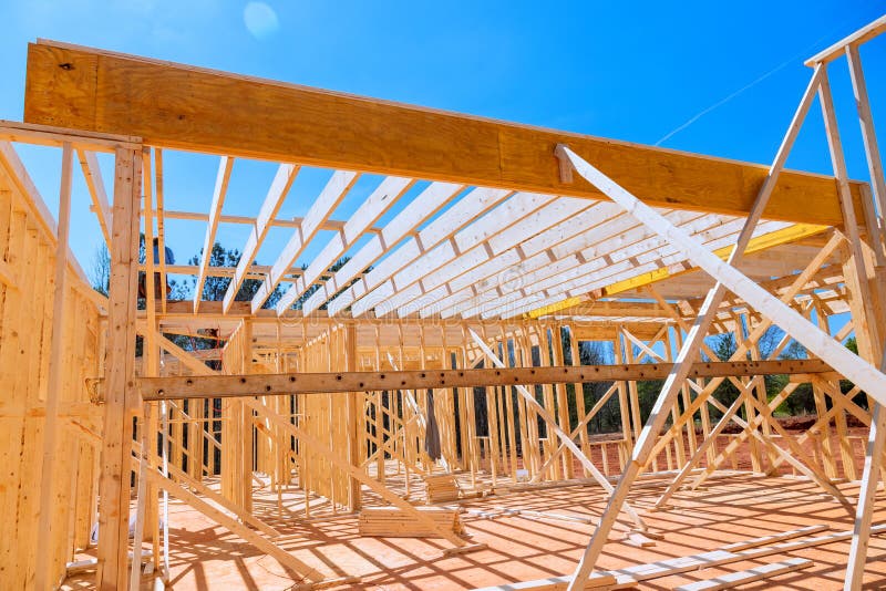 Building Framework for New Home with Wooden Truss, Beams, Posts As Part ...