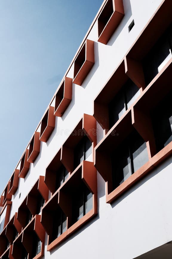 A Building with Orange Windows Frame Makes Diagonal Line Stock Photo ...