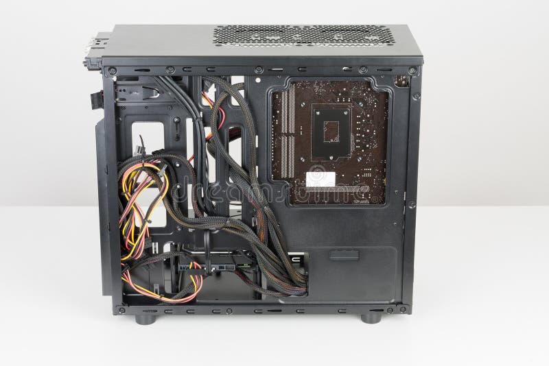 Building of PC, ATX Motherboard Inserted To Black Computer Midi Stock ...