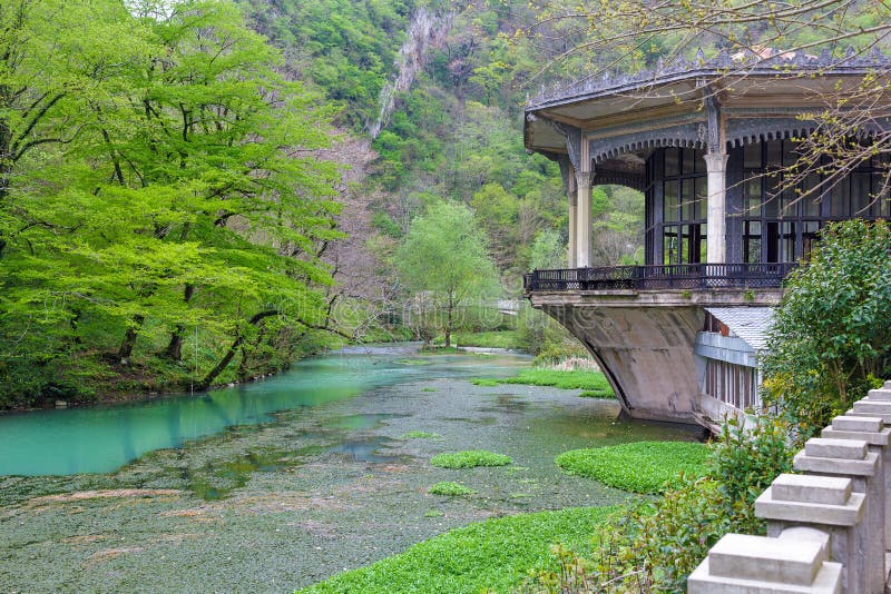Building and Pond with Blue Water in New Athos Stock Image - Image of ...