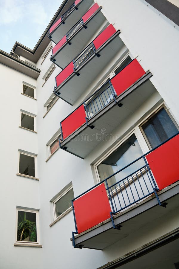 Building with Red Balconies Stock Photo - Image of block, style: 17458092