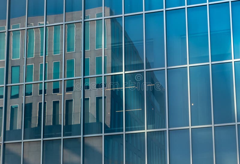 Building Reflected on Glass Facade Wall of Building Stock Photo - Image ...