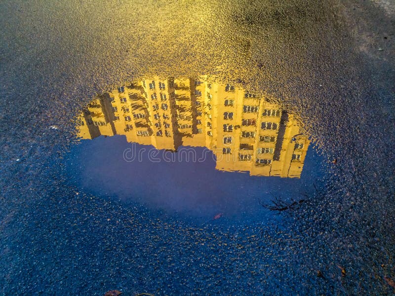 Building Reflection in a Puddle Stock Photo - Image of russia, saint ...