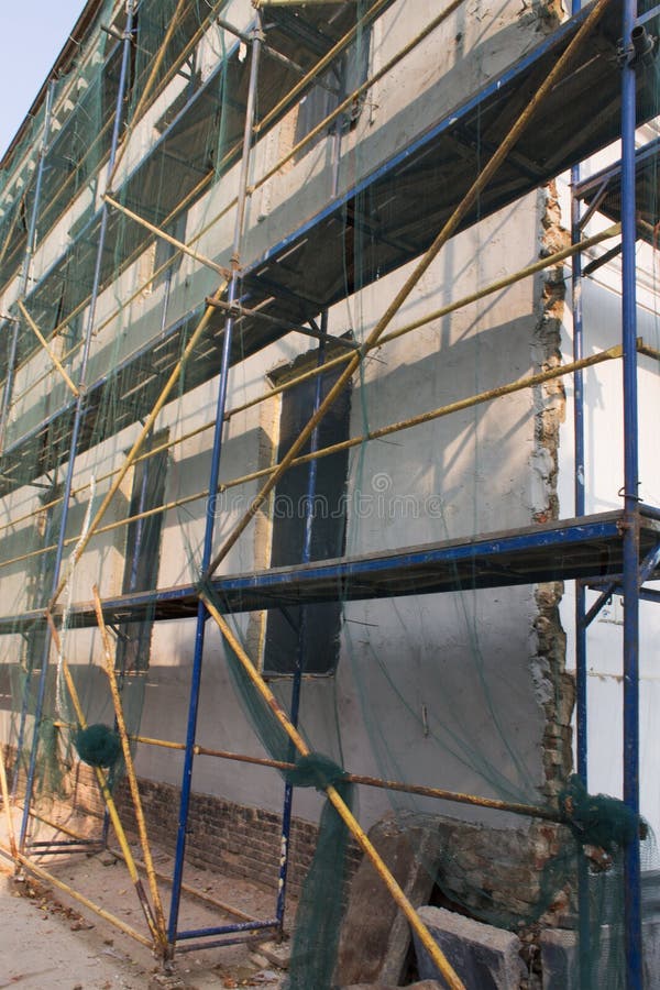 Building Repairs. Scaffolding Stock Photo - Image of town, work: 77046248