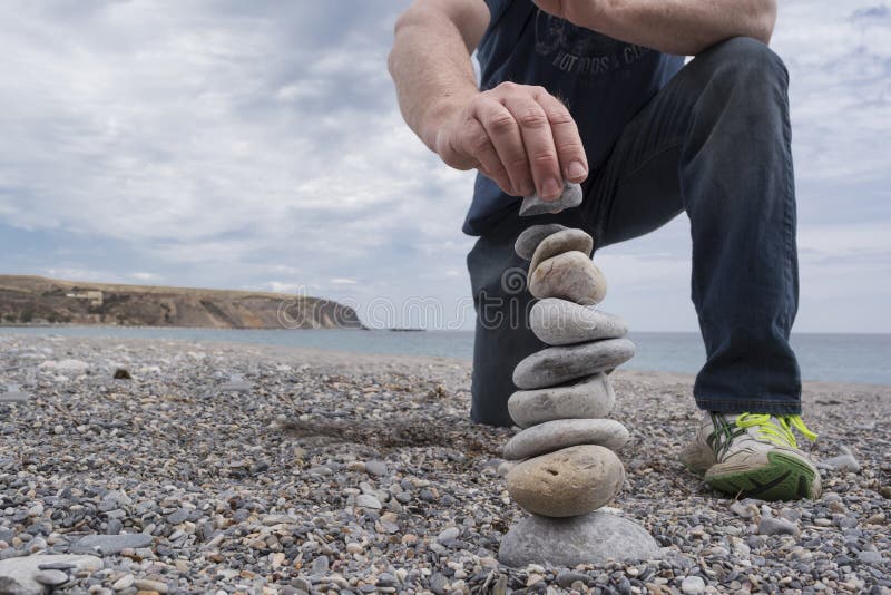 Building a Rock Stack at Rapid Bay, South Australia Stock Image - Image ...