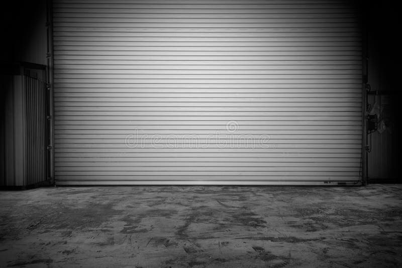 Building with Roller Shutter Door Stock Photo - Image of dark, empty ...