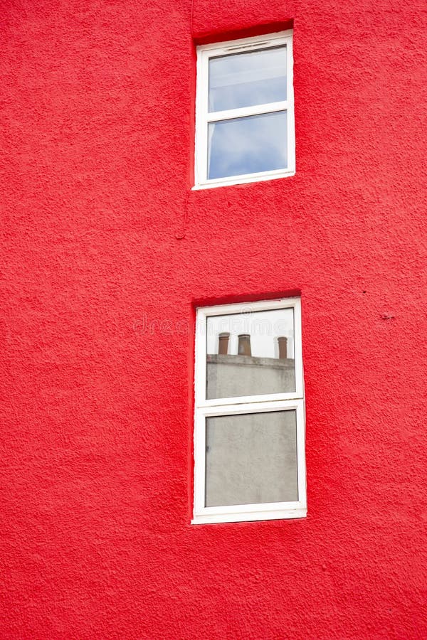 Building Painted Red with White Windows Stock Image - Image of floors ...