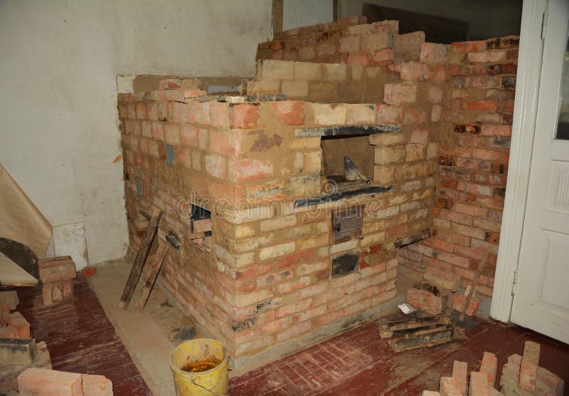 Building of a Russian Masonry Stove, Wood Fired Oven from a Red Fire ...