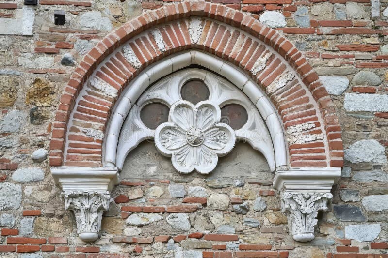 The Building S Brick Exterior Features an Old Neo-Gothic Bas-relief ...