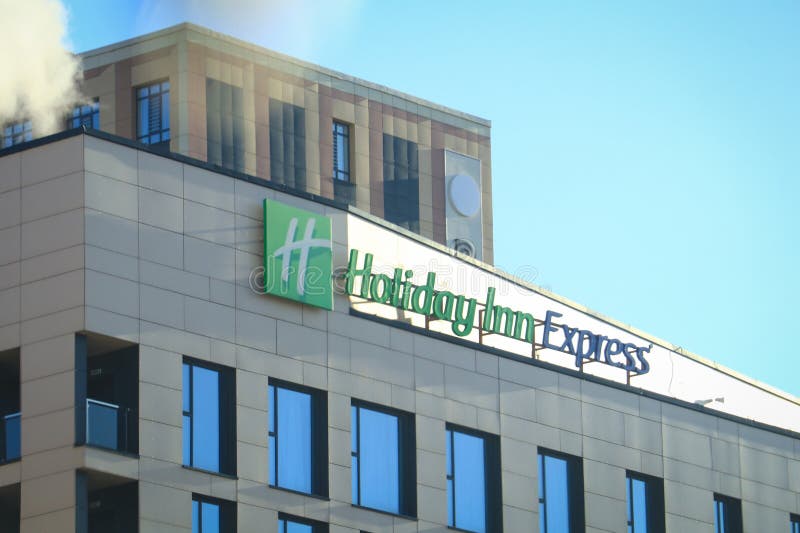 Holiday Inn Express Logo on the Building Under a Clear Blue Sky ...