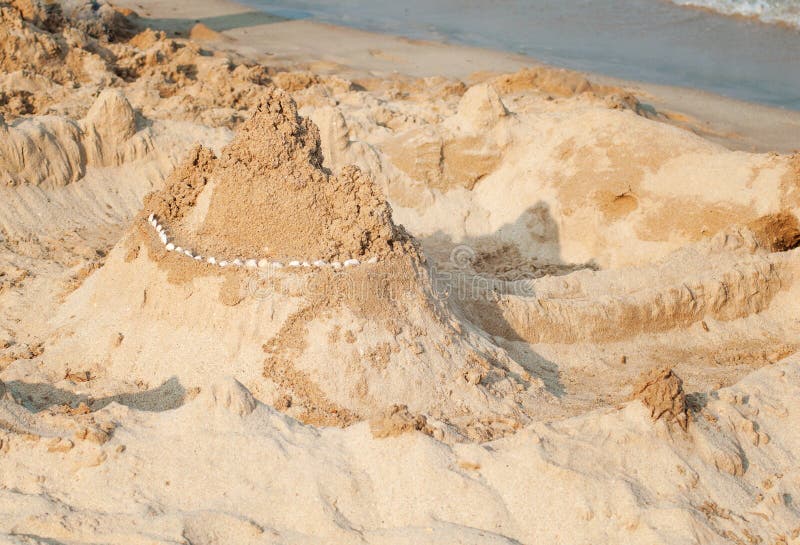 Building a sand castle stock photo. Image of castle, building - 42489782