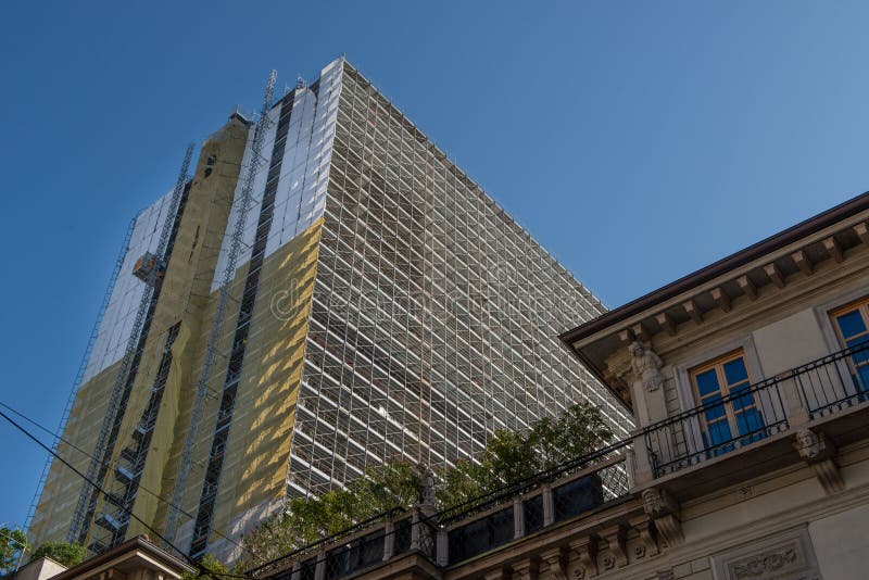 Building with Scaffolding and Protective Sheets Stock Image - Image of ...