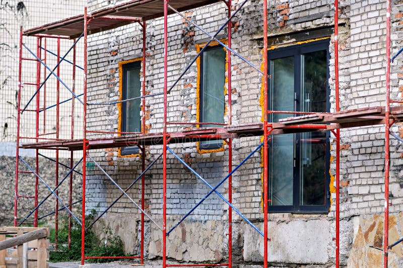 A Building with Scaffolding on the Side of it Stock Image - Image of ...