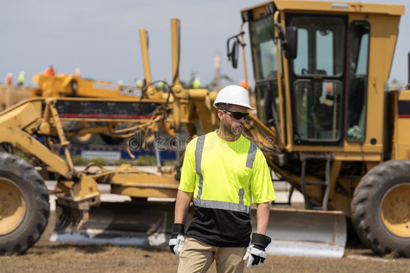 Building Side Outdoor. Man at Construction Site. Civil Construction Engineering. Man Engineer at ...
