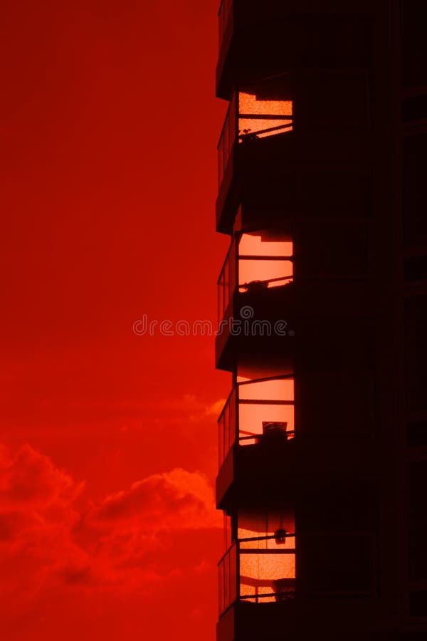 Building Silhouette Against a Burning Red Sunset Stock Image - Image of ...