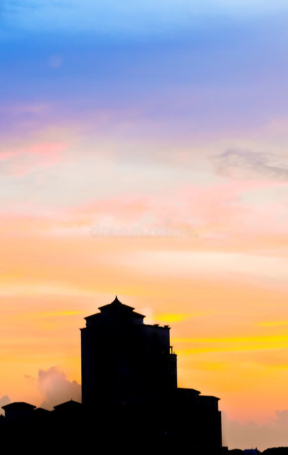 Building in Silhouette, at a Tropical Sunset Stock Image - Image of ...