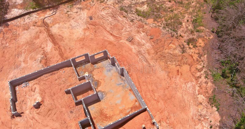 Building Site with Concrete Block Wall To Build the Foundation of a ...
